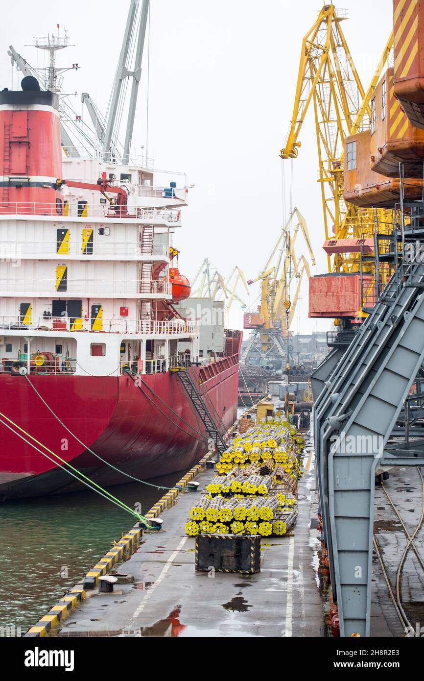 Vessel dry cargo on loading, unloading in port. Bulker in port. port ...