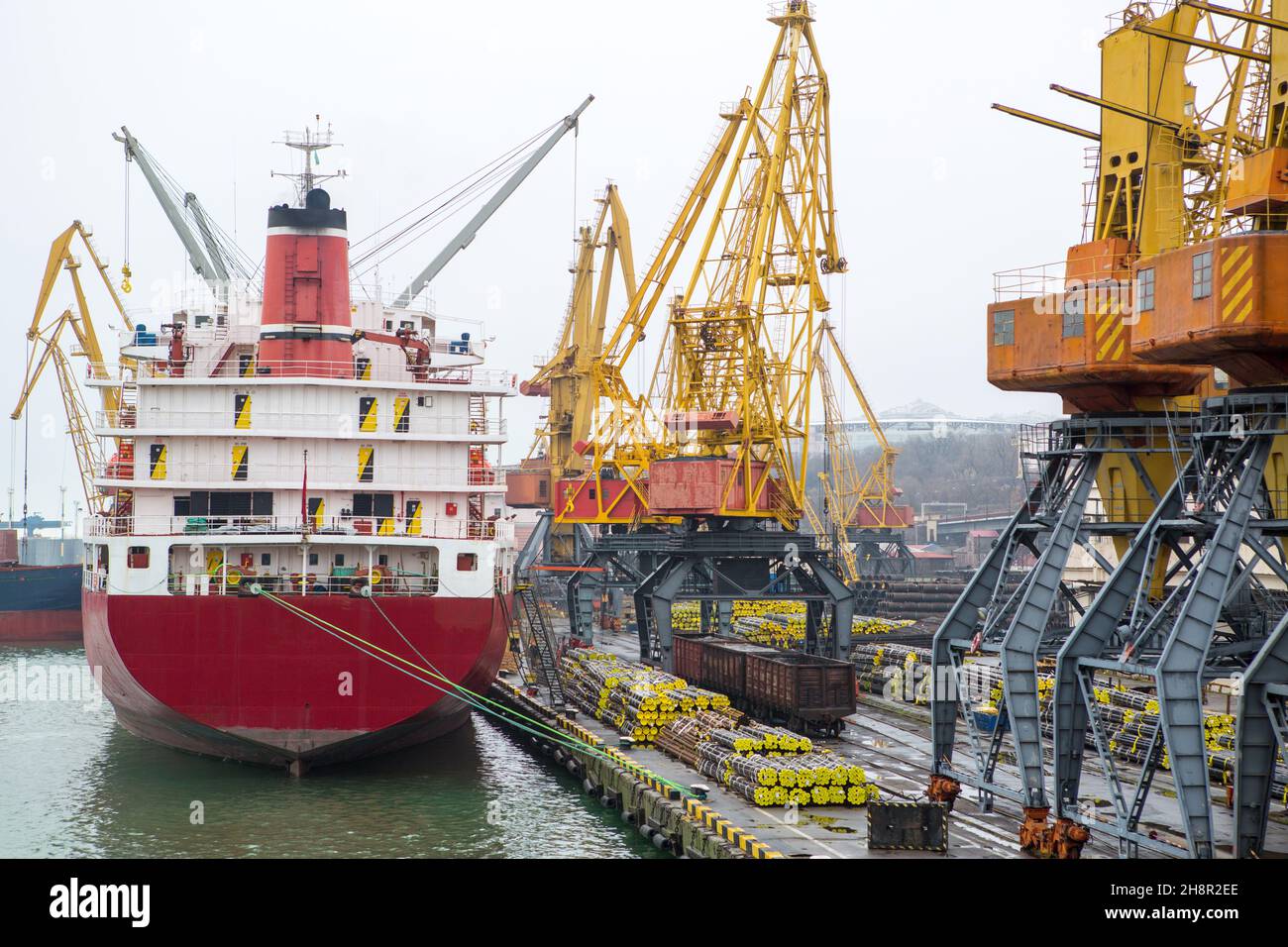 Vessel dry cargo on loading, unloading in port. Bulker in port. port ...