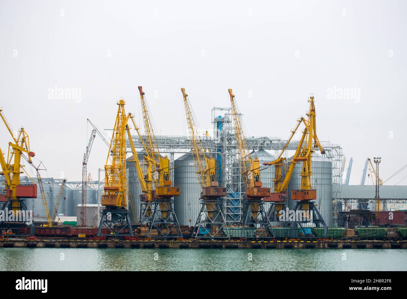 Vessel dry cargo on loading, unloading in port. Bulker in port. port ...