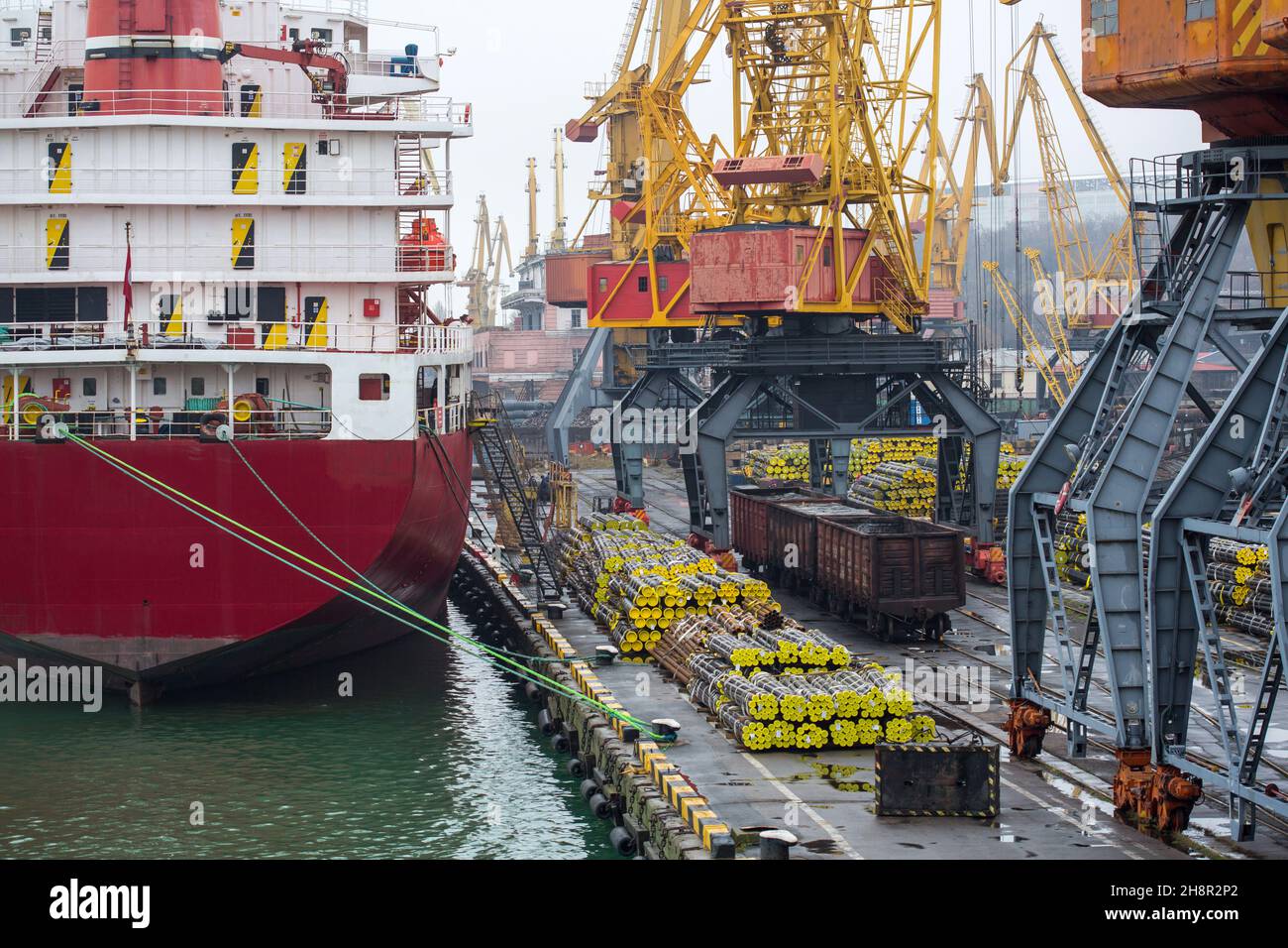 Vessel dry cargo on loading, unloading in port. Bulker in port. port ...