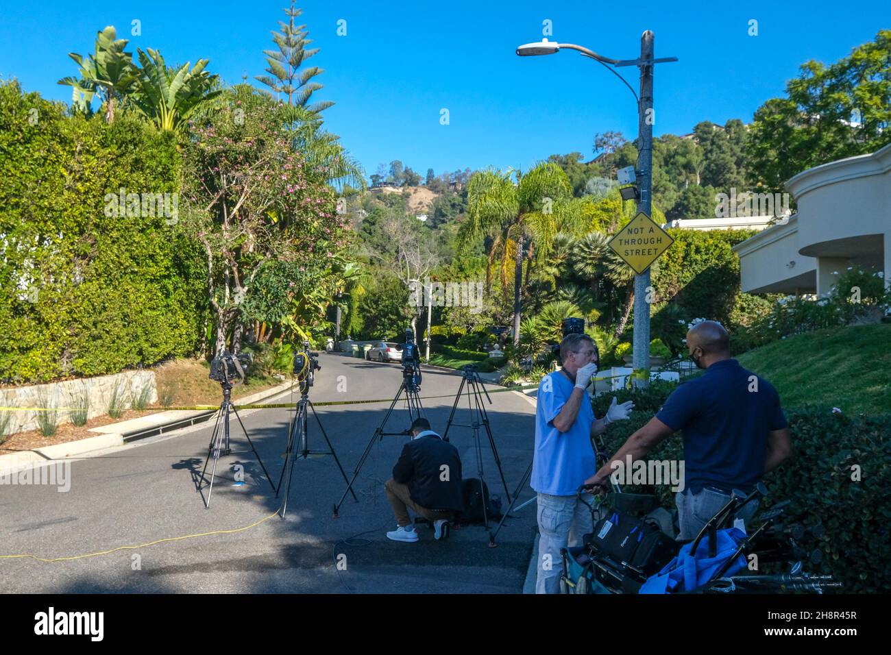 Beverly Hills, California, USA. 1st Dec, 2021. Media gather at the ...