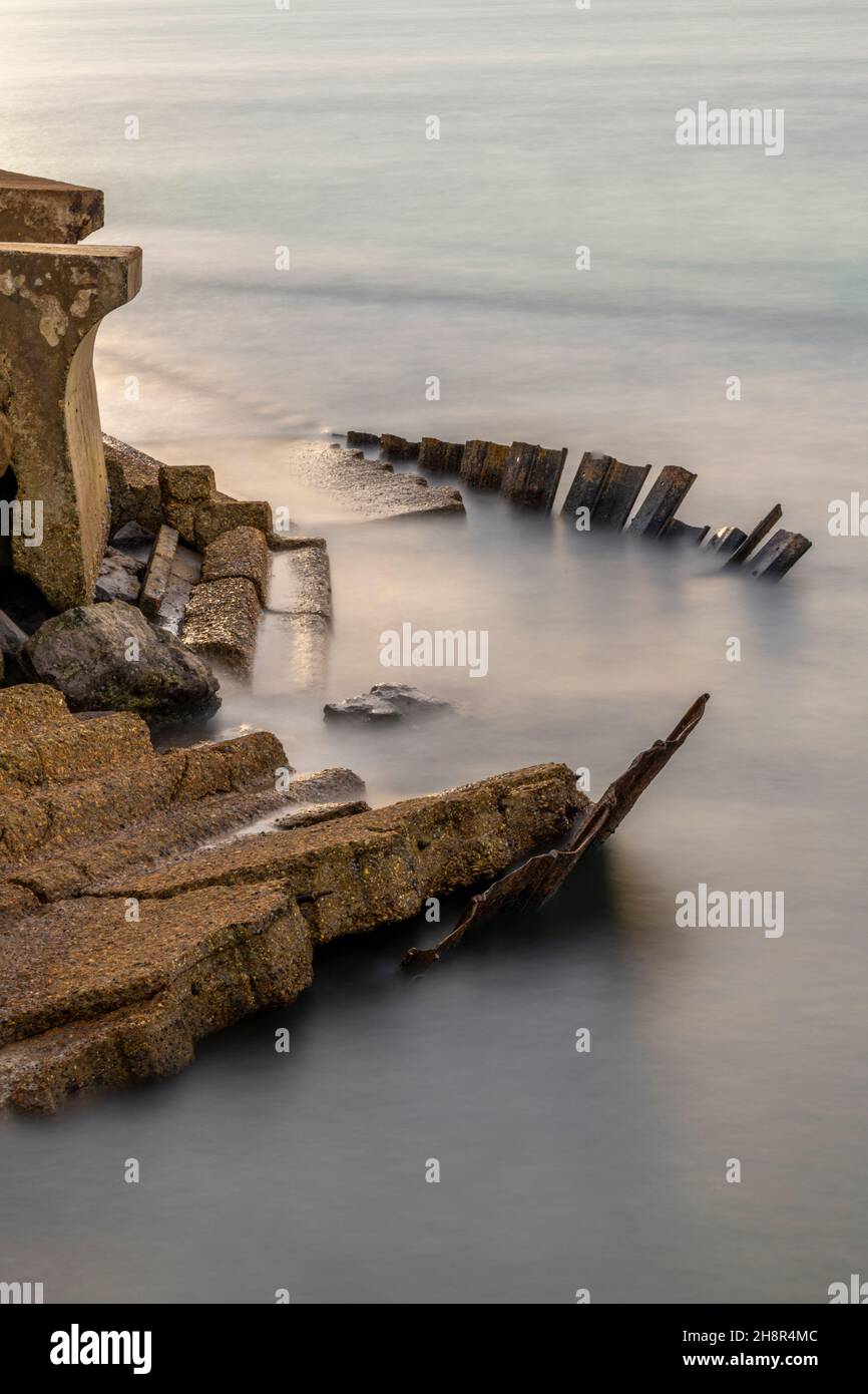 damaged sea wall after storms and coastal erosion on the isle of wight ...