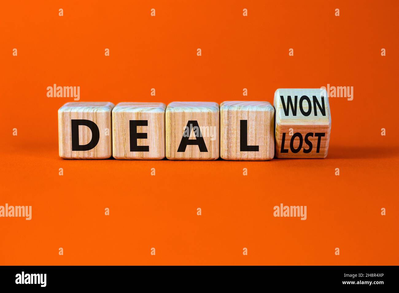 Deal lost or won symbol. Turned a wooden cube and changed words deal ...