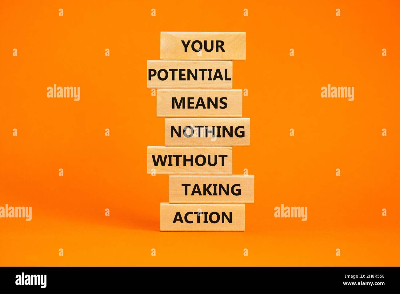 Potential in action symbol. Wooden blocks with words Your potential ...