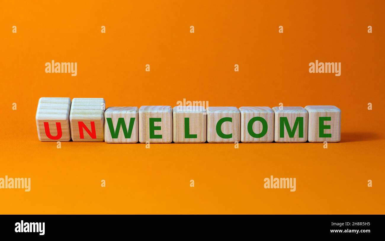 Welcome or unwelcome symbol. Turned wooden cubes and changed the word ...
