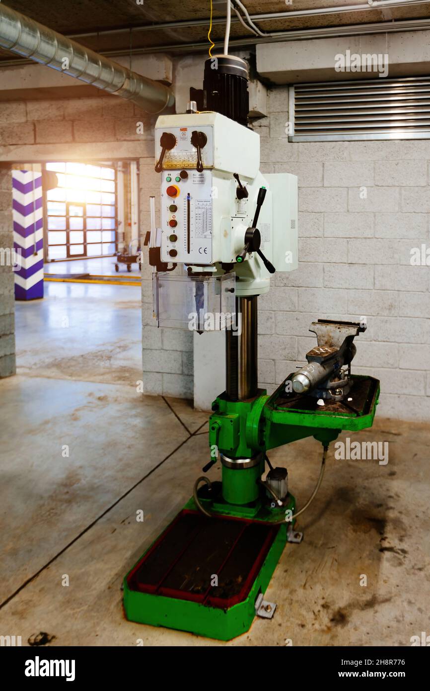 Industrial drilling machine tools in metalwork factory workshop Stock ...