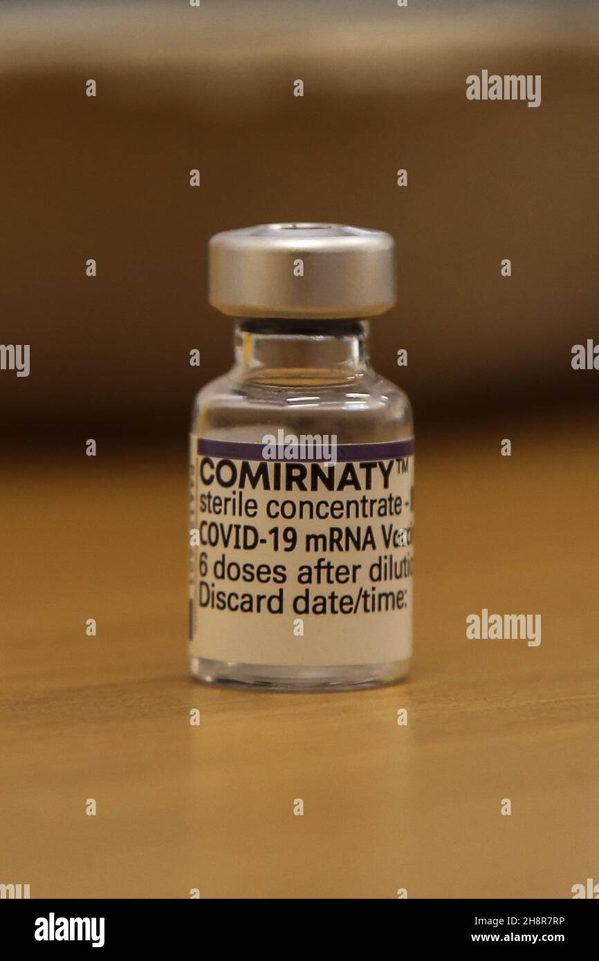 A vial containing the Covid-19 booster vaccine is seen at a vaccination ...