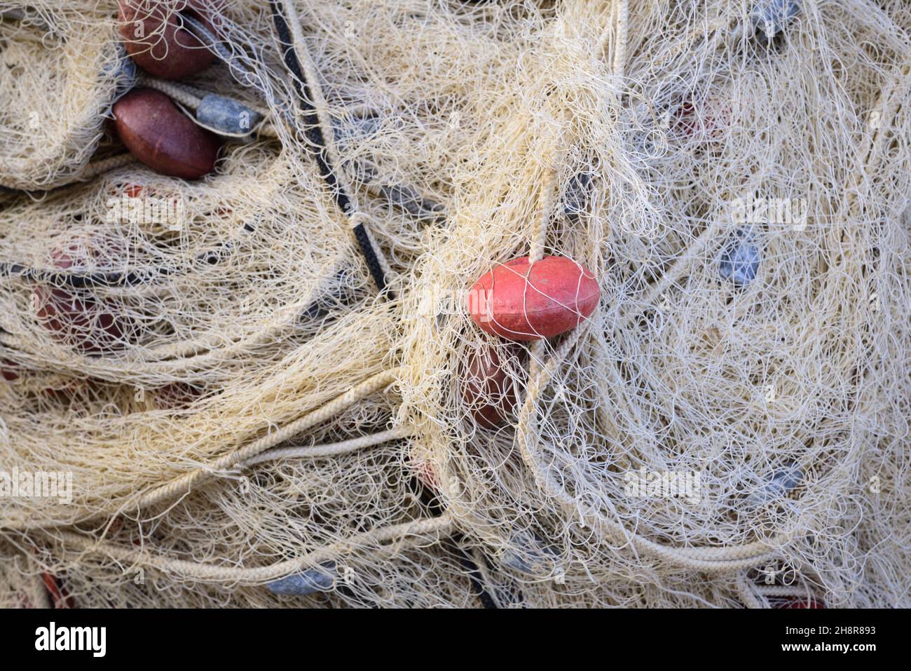 Close up, close up view and background of used brown fishing nets laid ...
