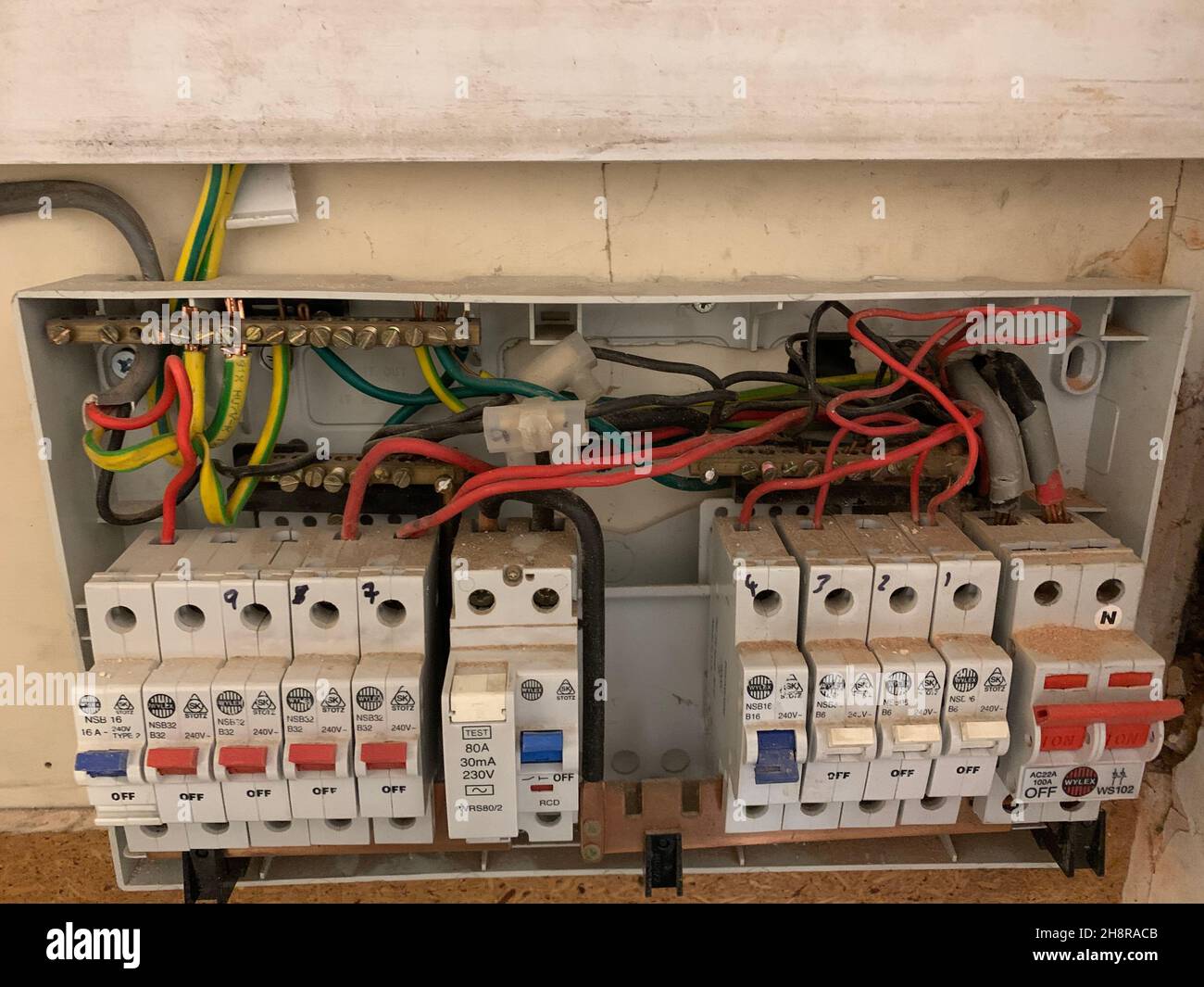 Electric mains unit meter and switches Stock Photo - Alamy
