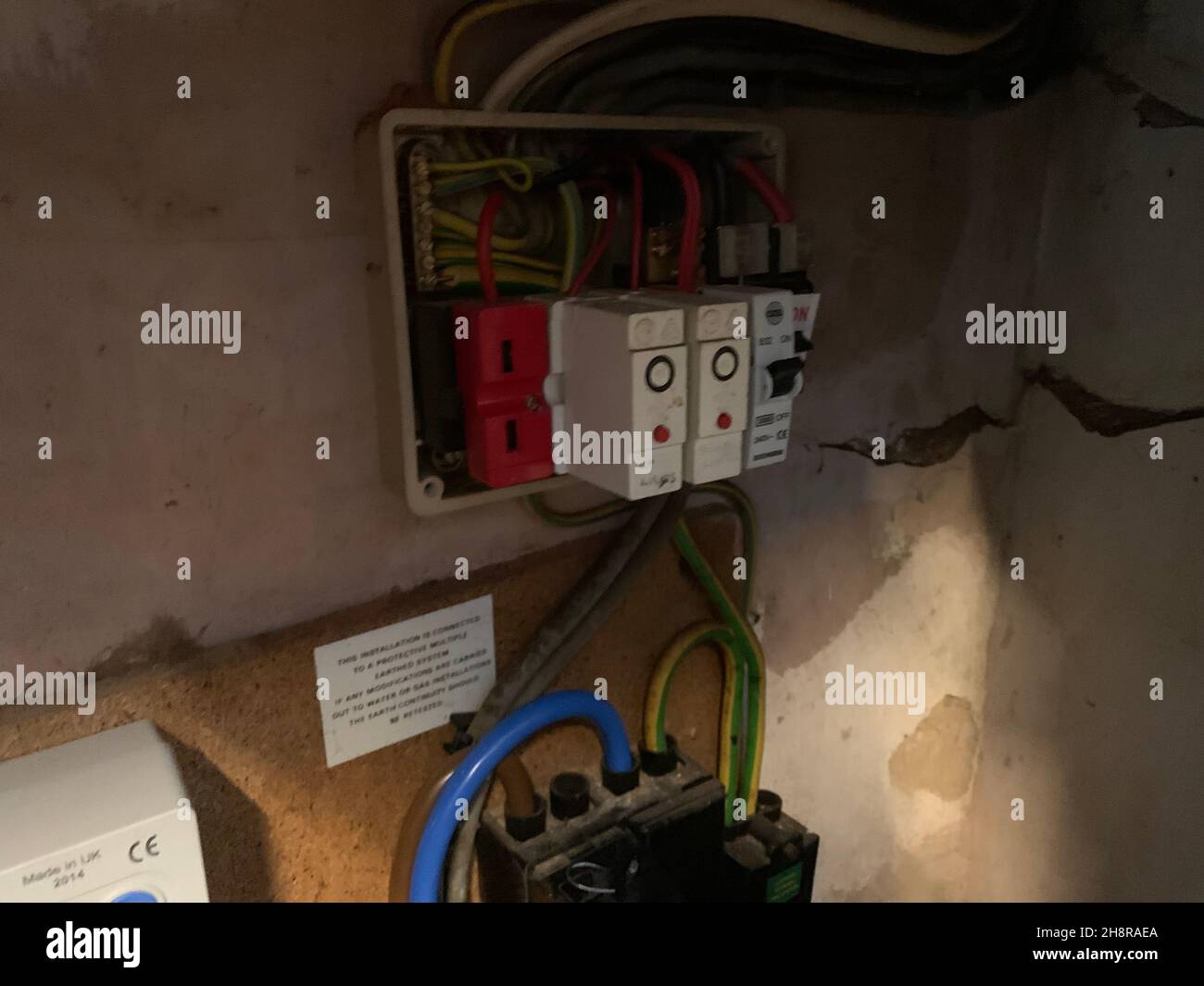 Electric mains unit meter and switches Stock Photo - Alamy