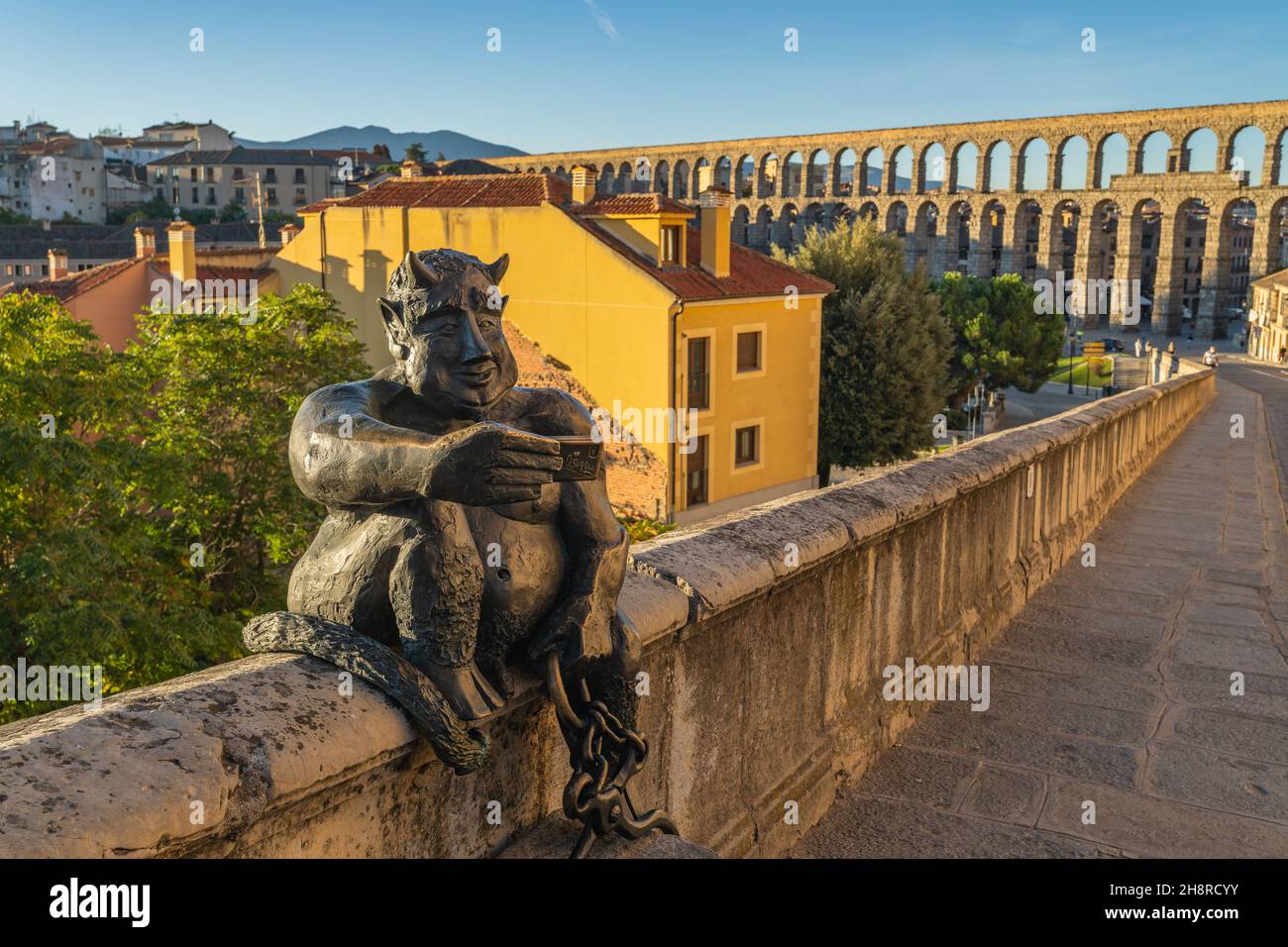 Devil and aqueduct in the city of Segovia in Spain Stock Photo - Alamy