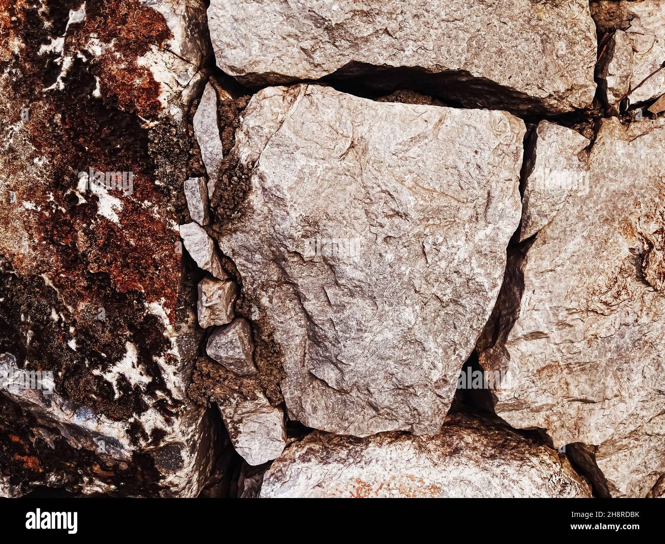 Stone texture and exterior design concept. Stonewall made of natural ...