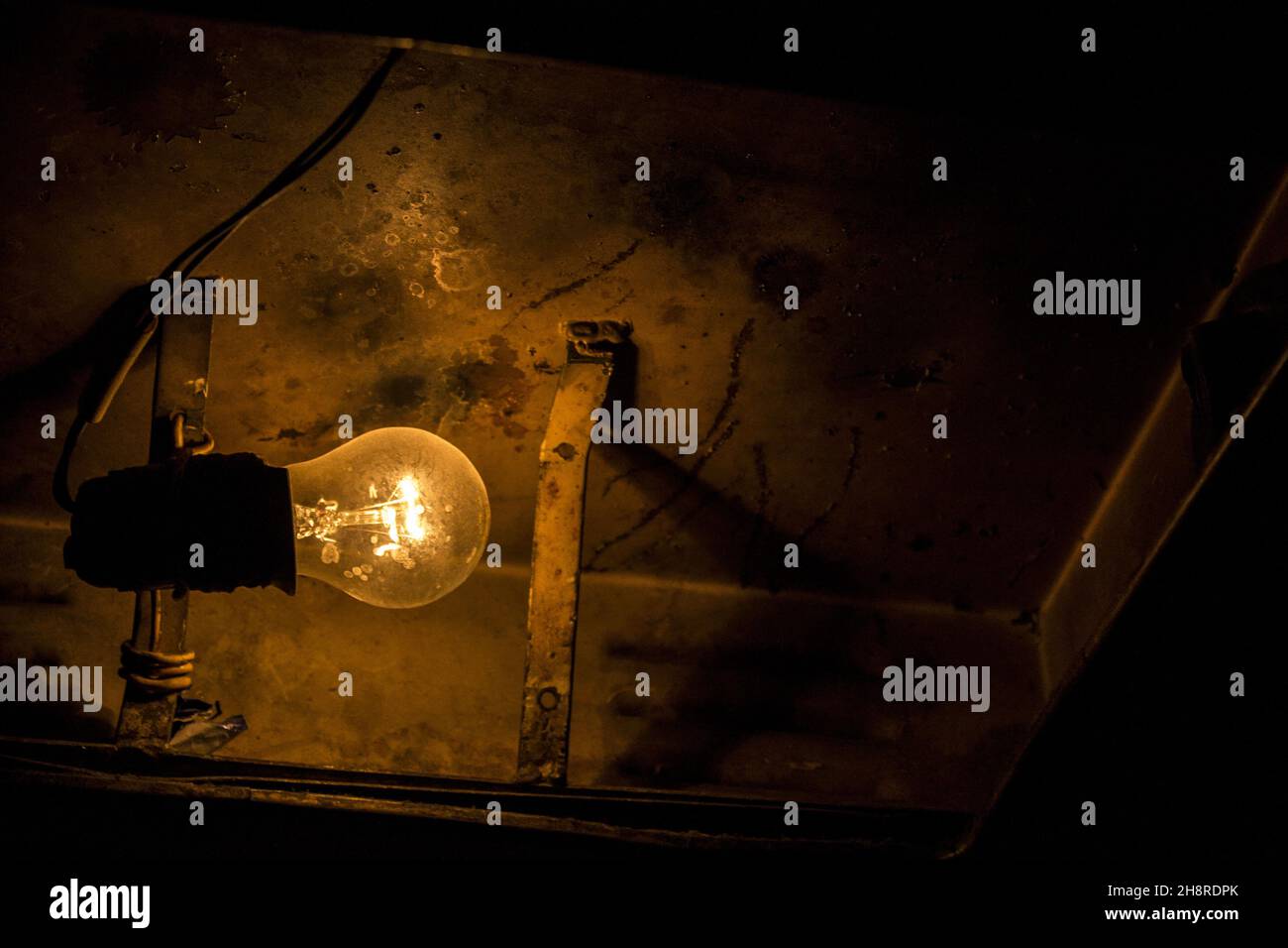 Closeup shot of an old light bulb in the dirty place Stock Photo - Alamy