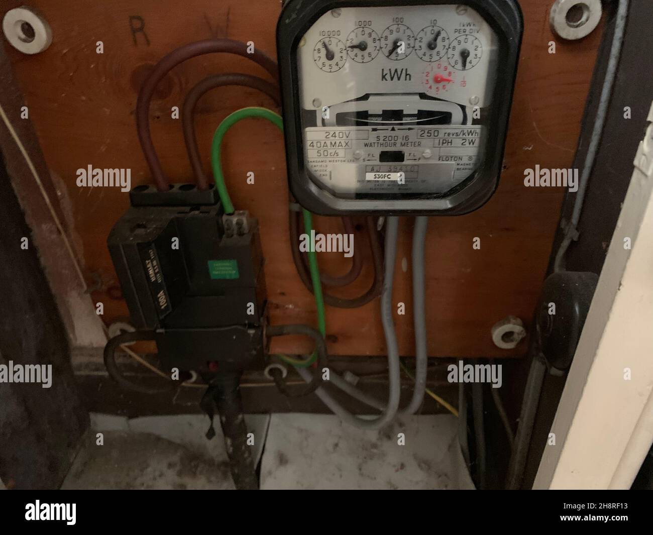 Electric mains unit meter and switches Stock Photo - Alamy