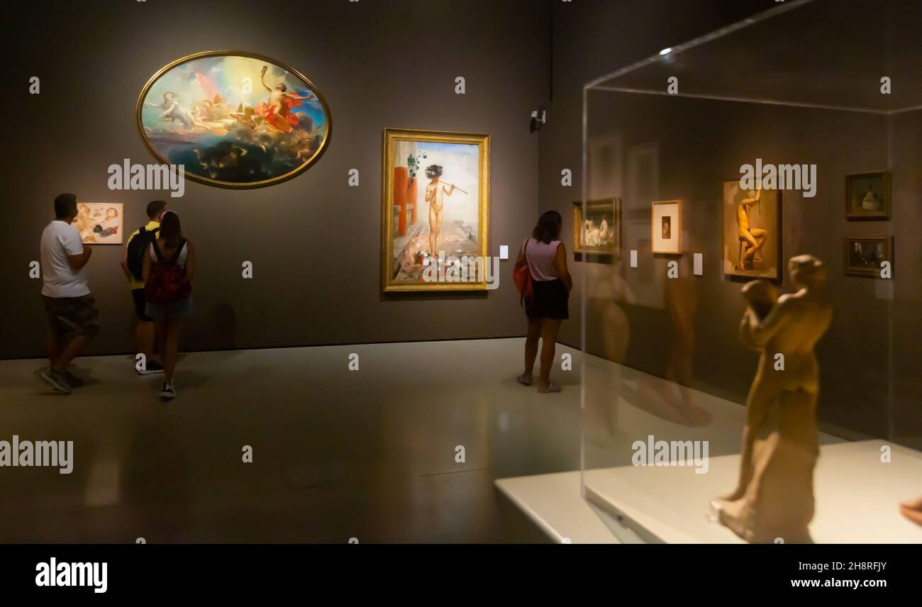 Hall of National Art Museum of Catalonia with visitors contemplating paintings Stock Photo - Alamy
