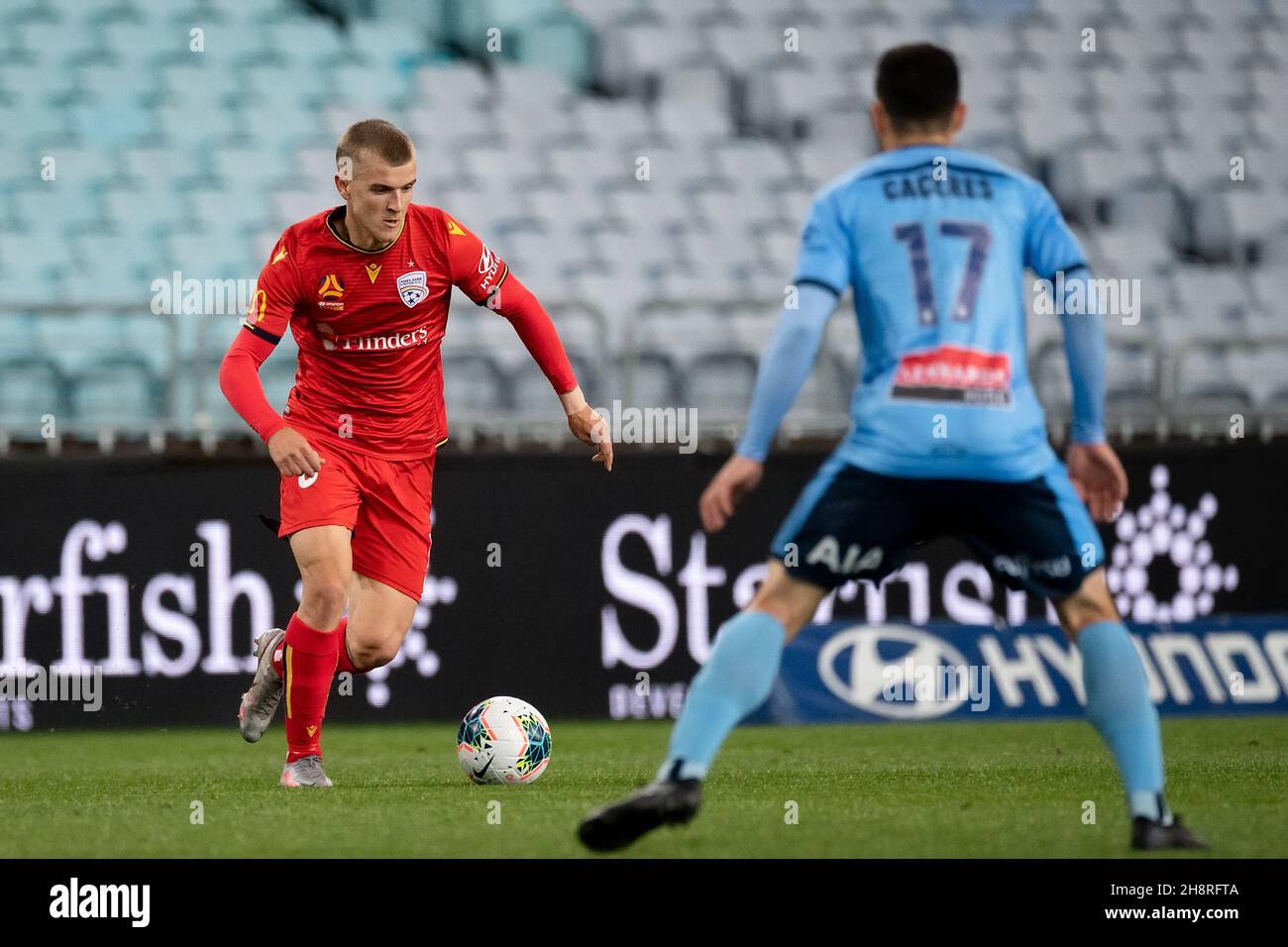 Adelaide United midfielder Riley McGree (8) controls the ball Stock ...