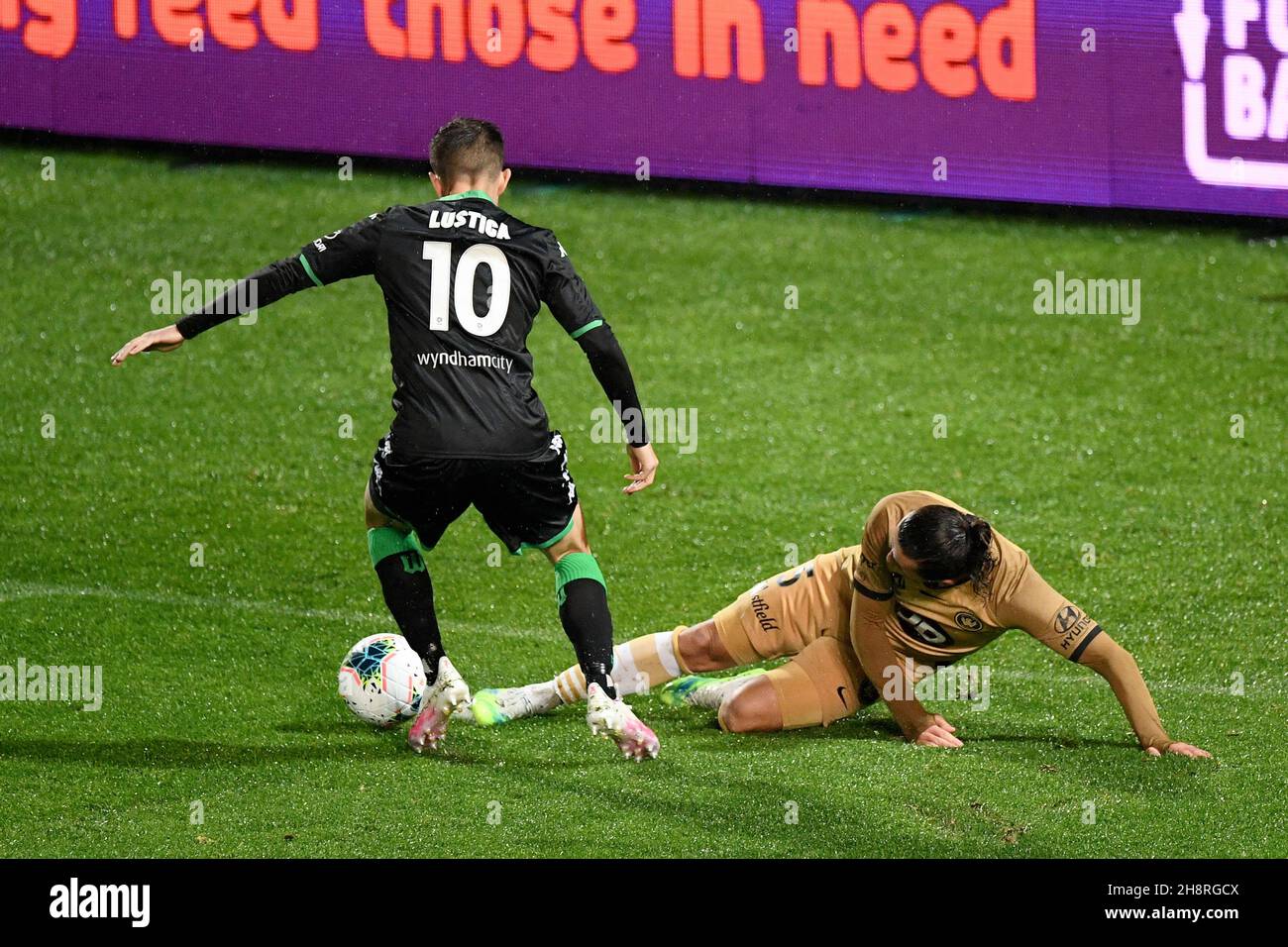 Western Sydney Wanderers defender Daniel Georgievski (5) slips over ...