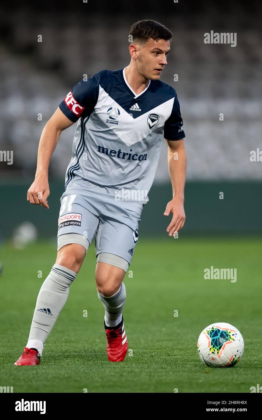 Melbourne Victory defender Aaron Anderson (31) controls the ball Stock ...