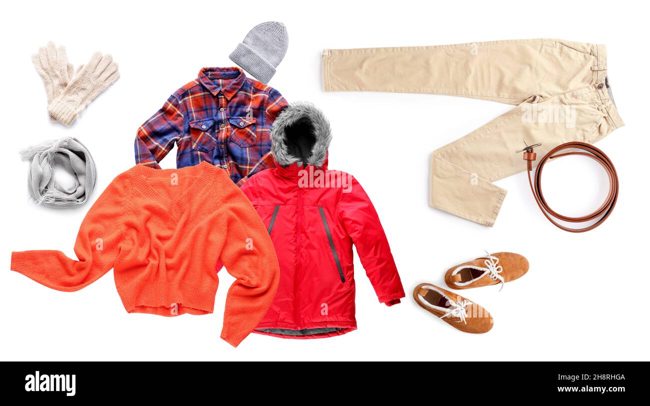 Stylish winter clothes on white background Stock Photo - Alamy