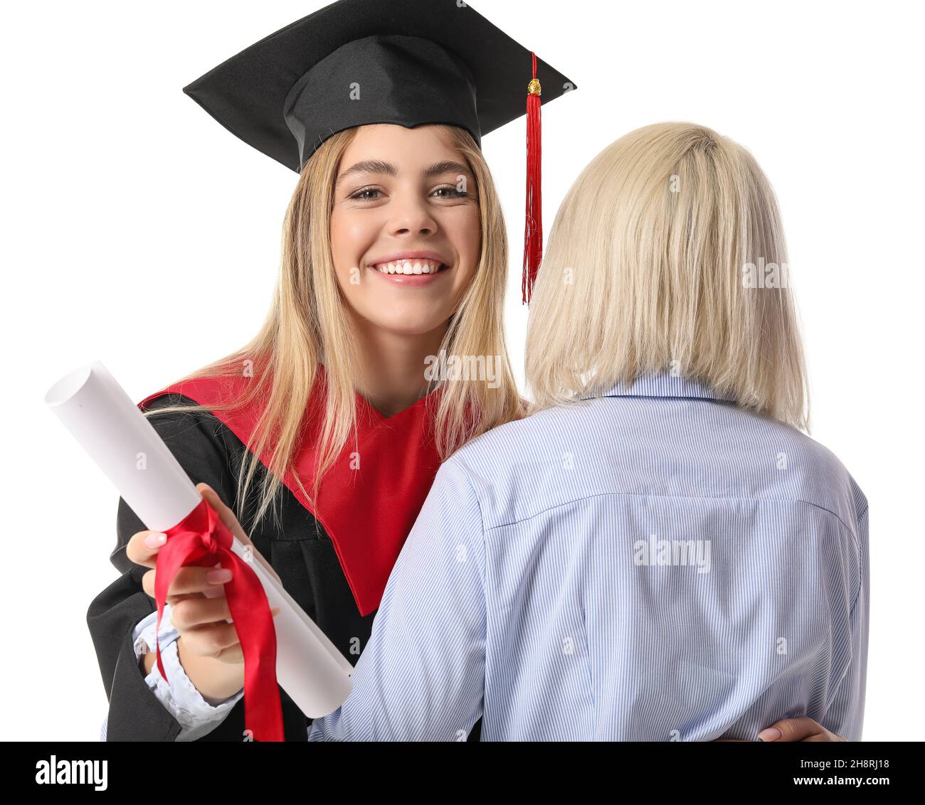 Happy female graduation student with her mother on white background ...