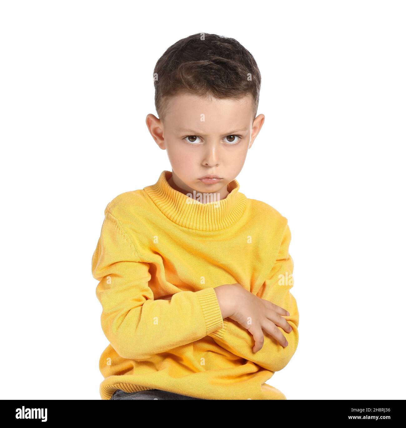 Portrait of offended little boy on white background Stock Photo - Alamy