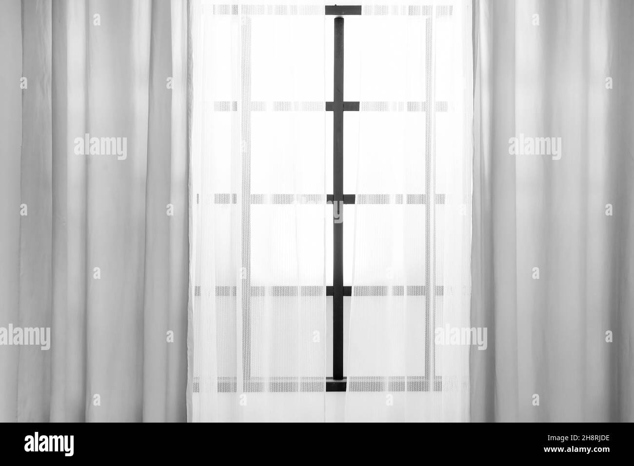 Big window with light curtains in room Stock Photo - Alamy