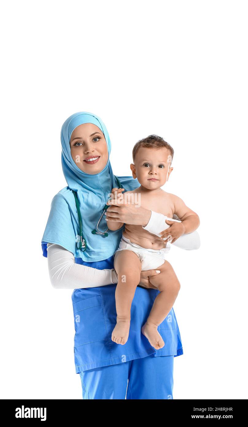 Muslim pediatrician with baby boy on white background Stock Photo - Alamy