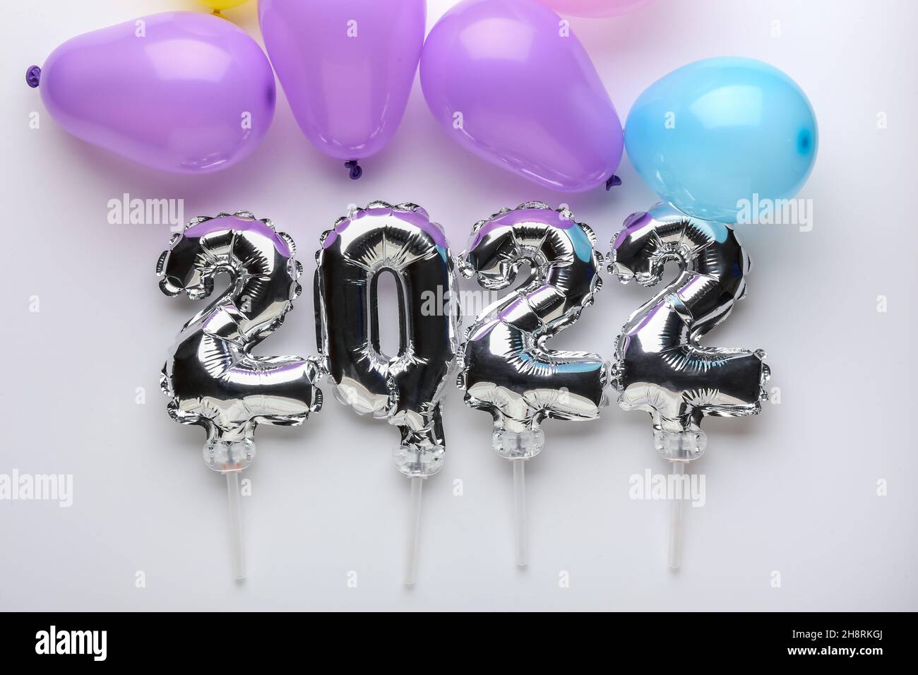 Figure 2022 made of silver balloons on light background Stock Photo - Alamy