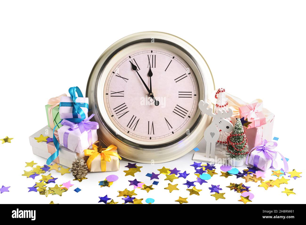 Stylish New Year clock with Christmas gift boxes on white background ...