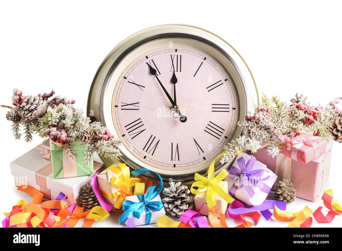 Stylish New Year clock with Christmas gift boxes and fir branches on ...