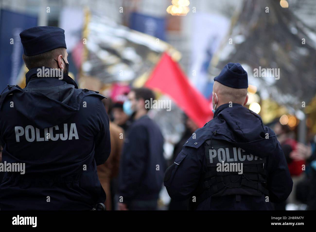 Police officers looking at the protesters during the demonstration ...