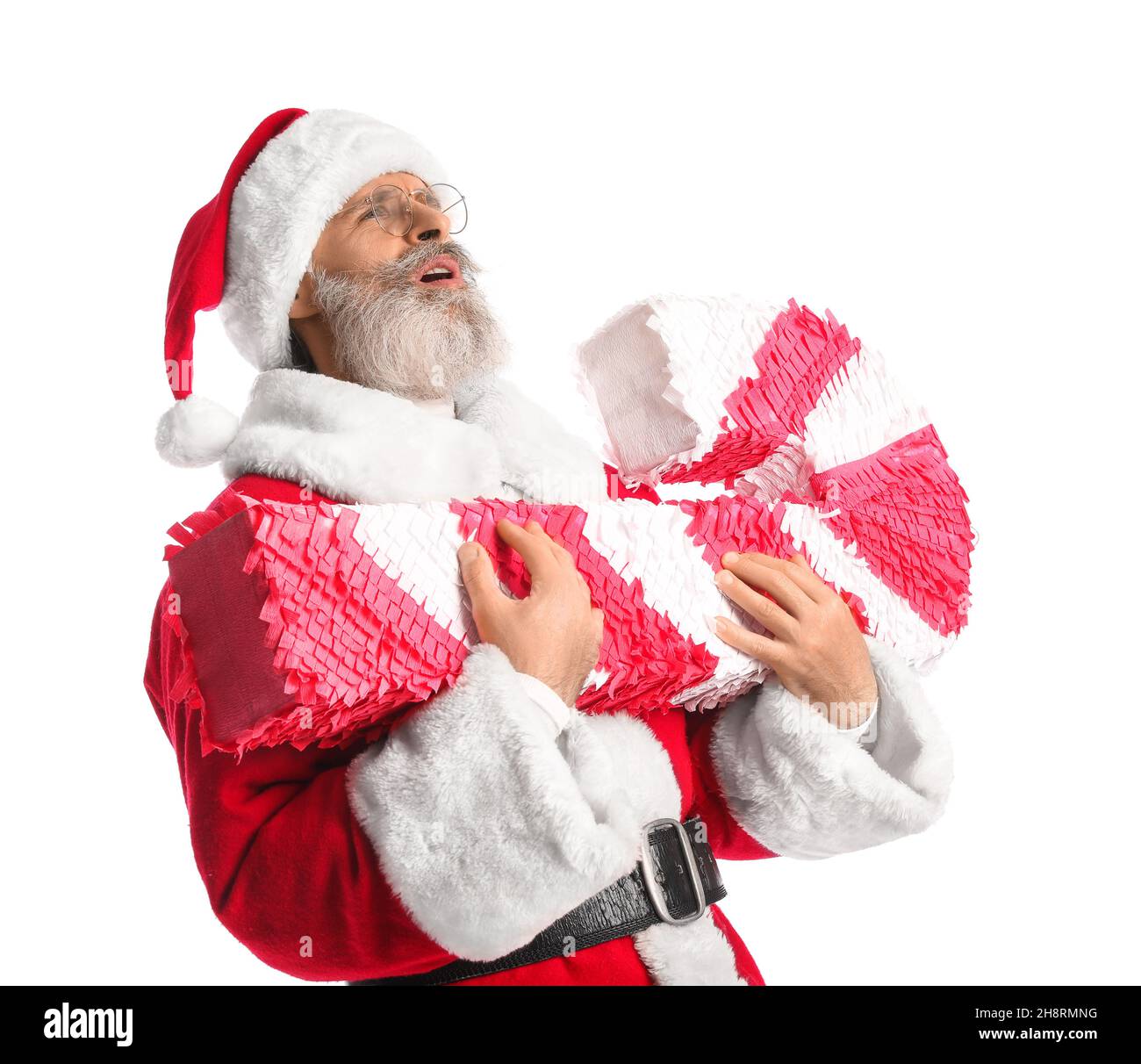 Santa Claus with candy cane pinata isolated on white Stock Photo - Alamy