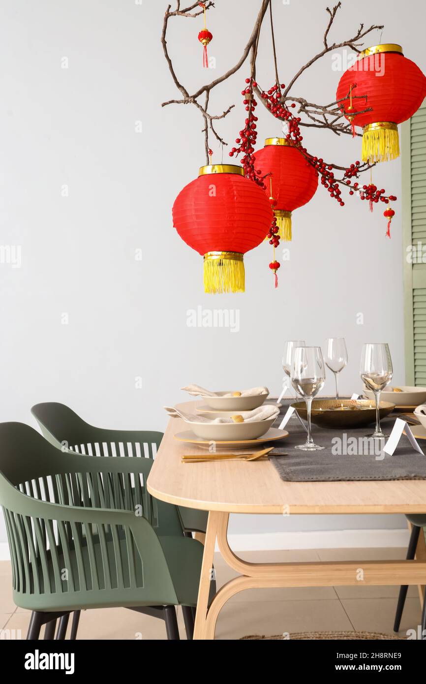 Beautiful table setting for Chinese New Year celebration in room Stock ...