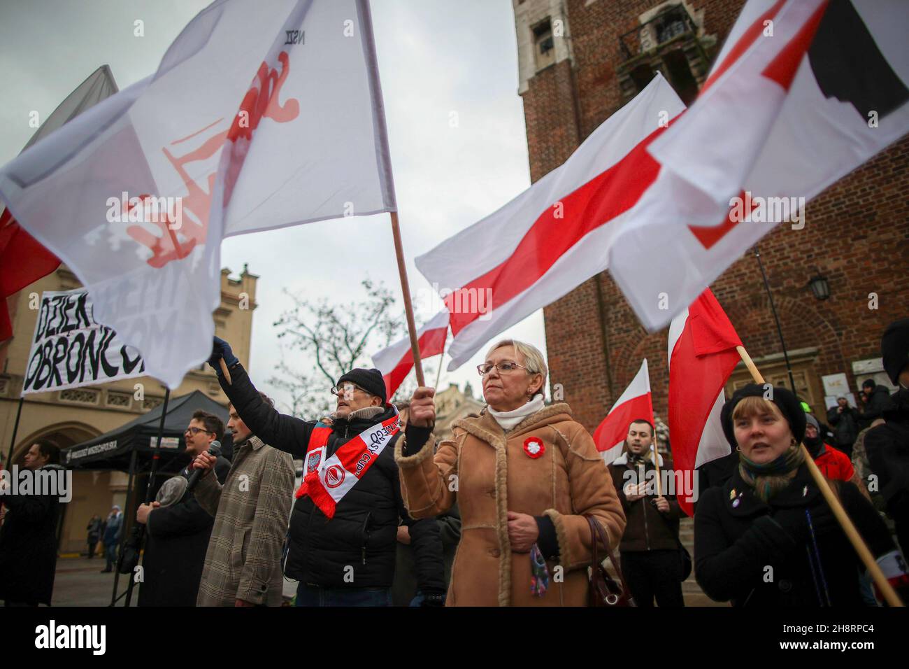 Krakow, Poland. 20th Nov, 2021. Protesters hold Polish flags during the ...