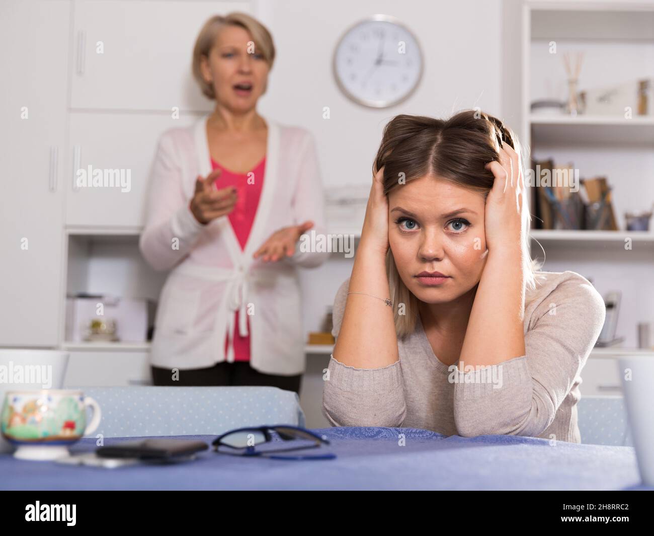 Mother scolds her adult daughter Stock Photo - Alamy
