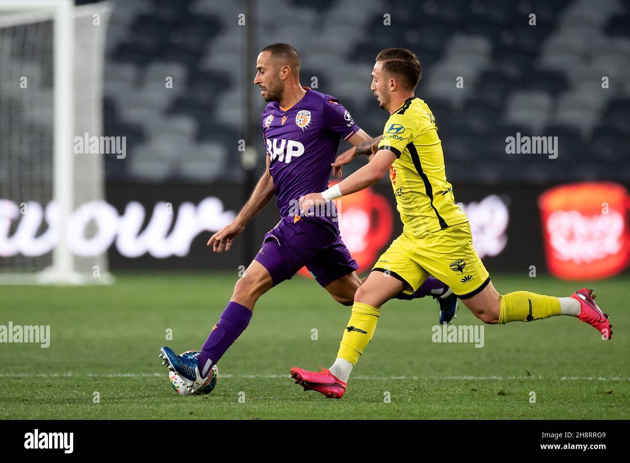 Perth Glory midfielder Tarek Elrich (21) controls the ball Stock Photo ...