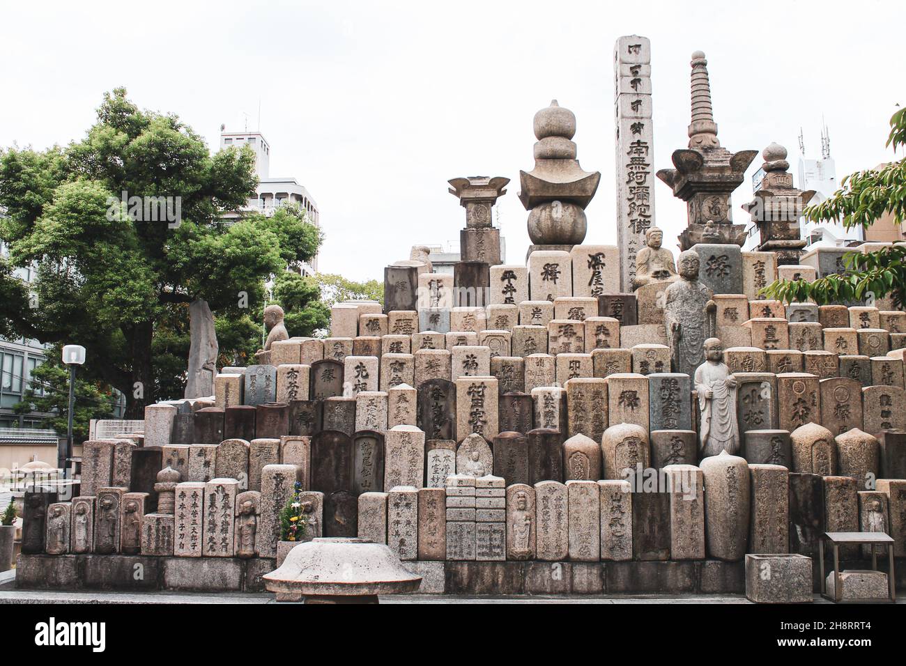 Japanese graveyard with Jizo Bodhisattva statues near Shitennoji temple ...