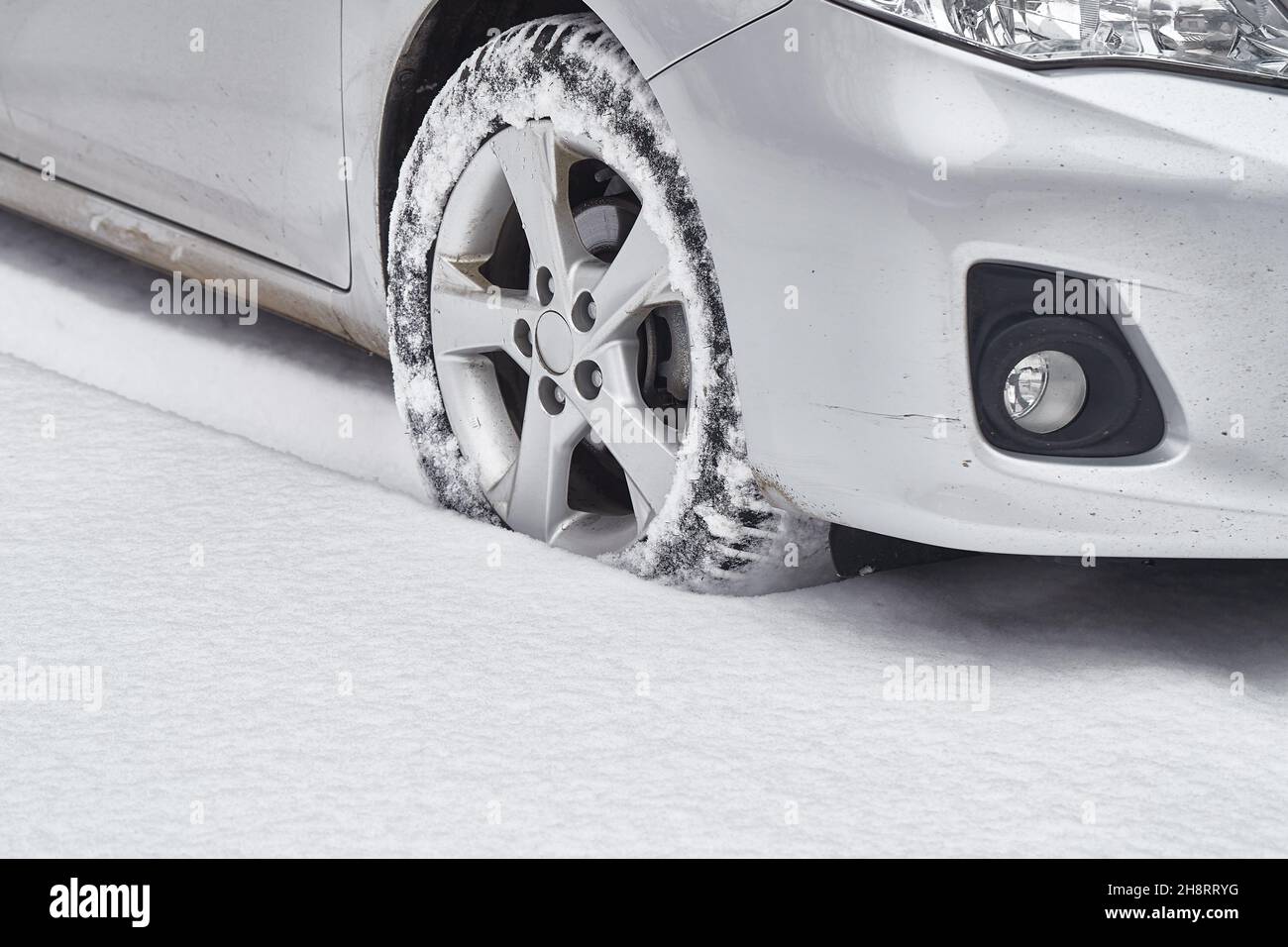 Car tyre in snow Stock Photo - Alamy