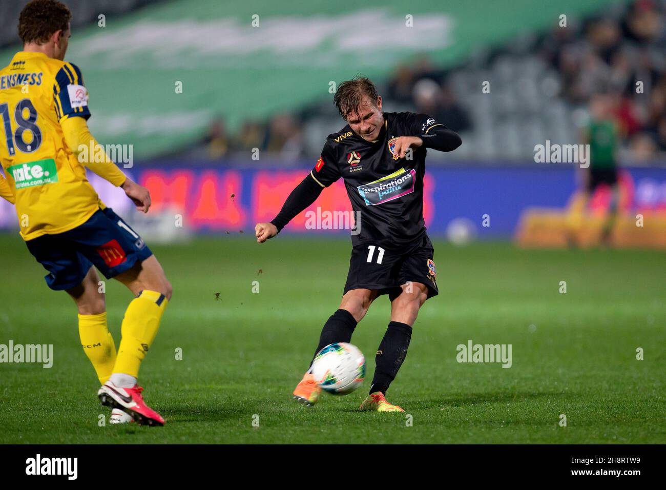 Newcastle Jets forward Nicholas Fitzgerald (11) shoots at goal. (Photo ...