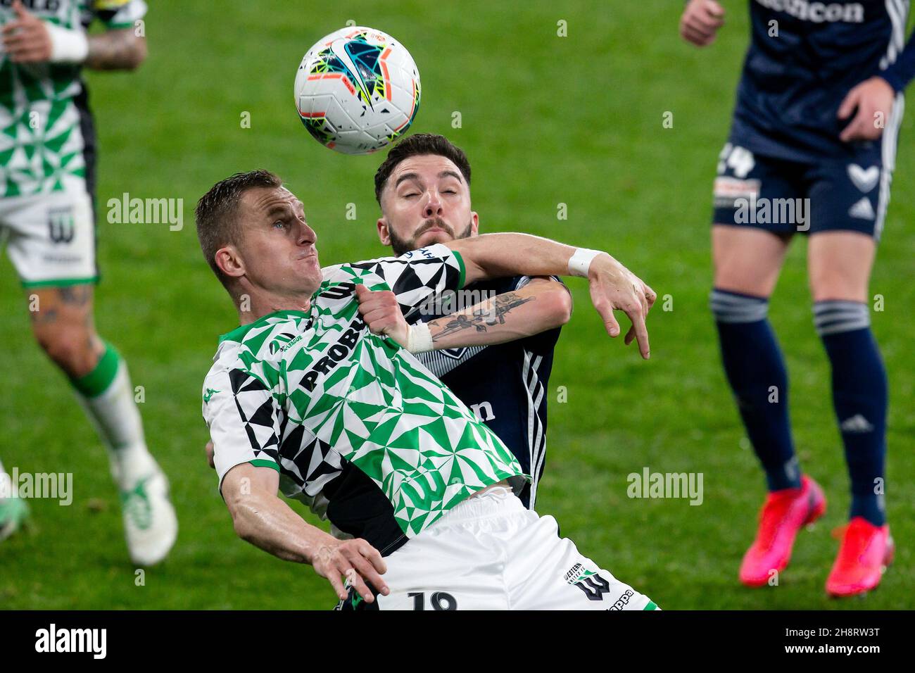 Western United forward Besart Berisha (18) controls the ball pressure from Melbourne Victory ...