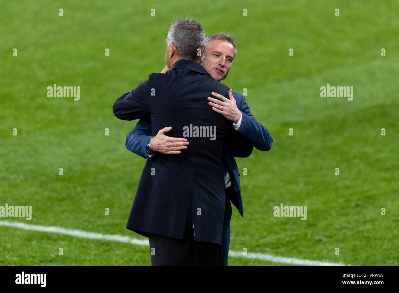 Western United coach Mark Rudan embraces Melbourne Victory coach Grant ...