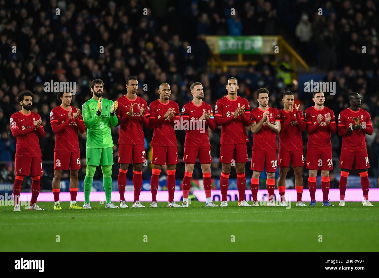 Liverpool Players pay their respects with a minutes applause Stock ...