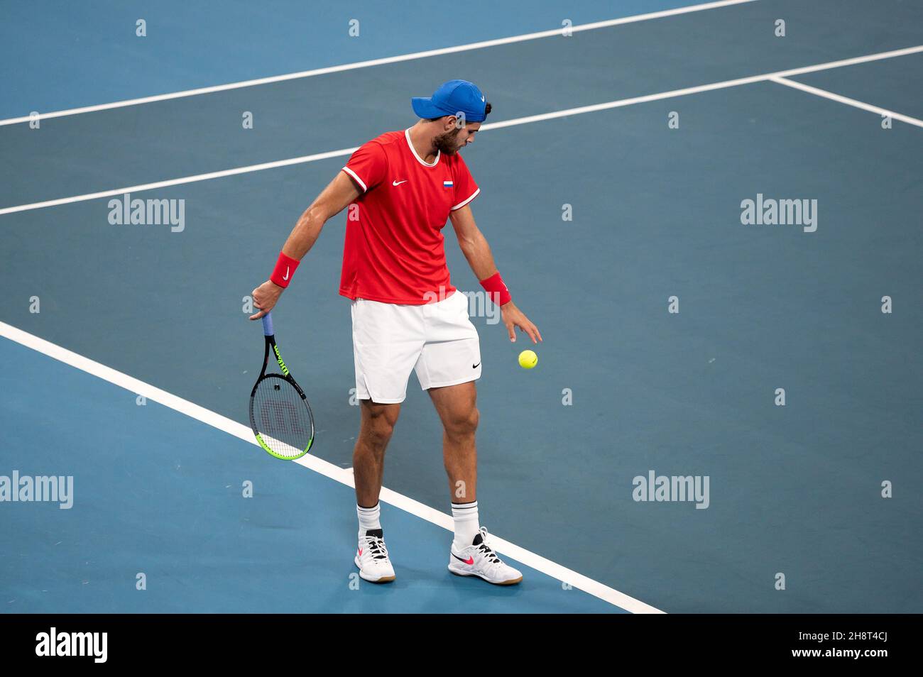 SYDNEY, AUSTRALIA - JANUARY 11: Konstantin Kravchuk of Russia serves ...