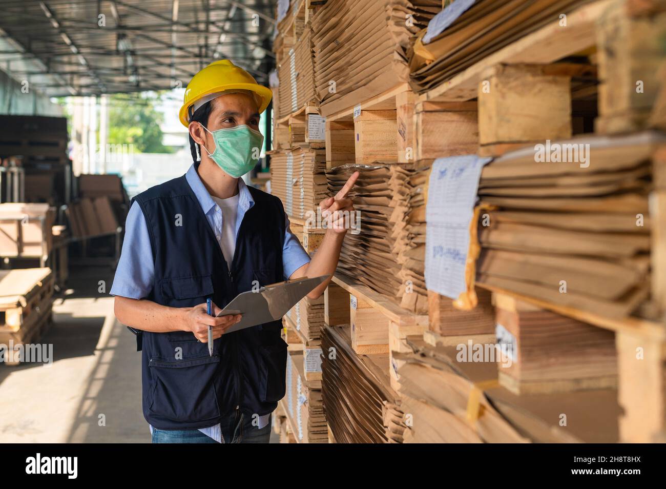 Worker checking raw material in store for factory industrial, Safety ...