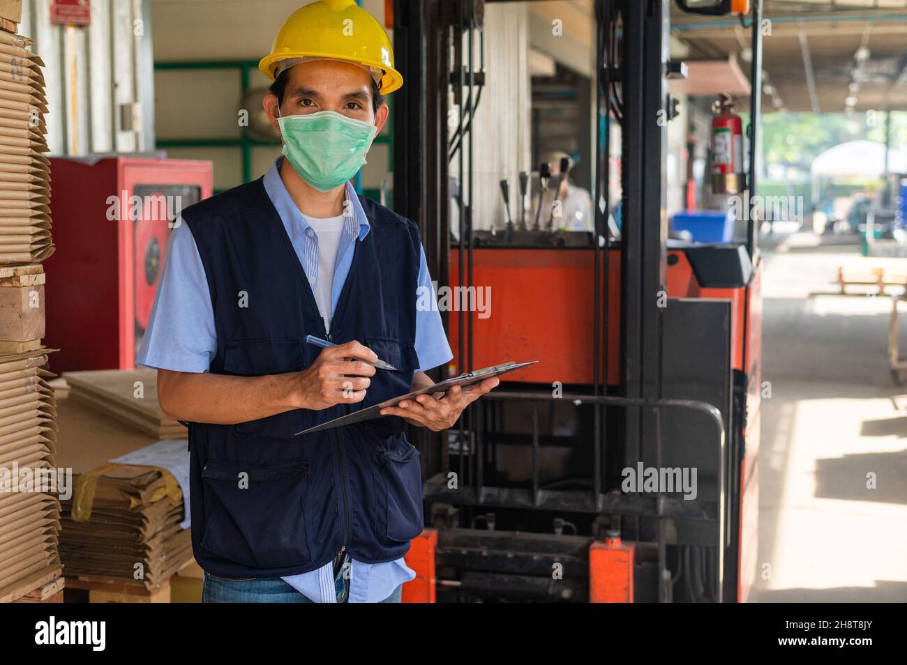 Worker checking raw material in store for factory industrial, Safety ...