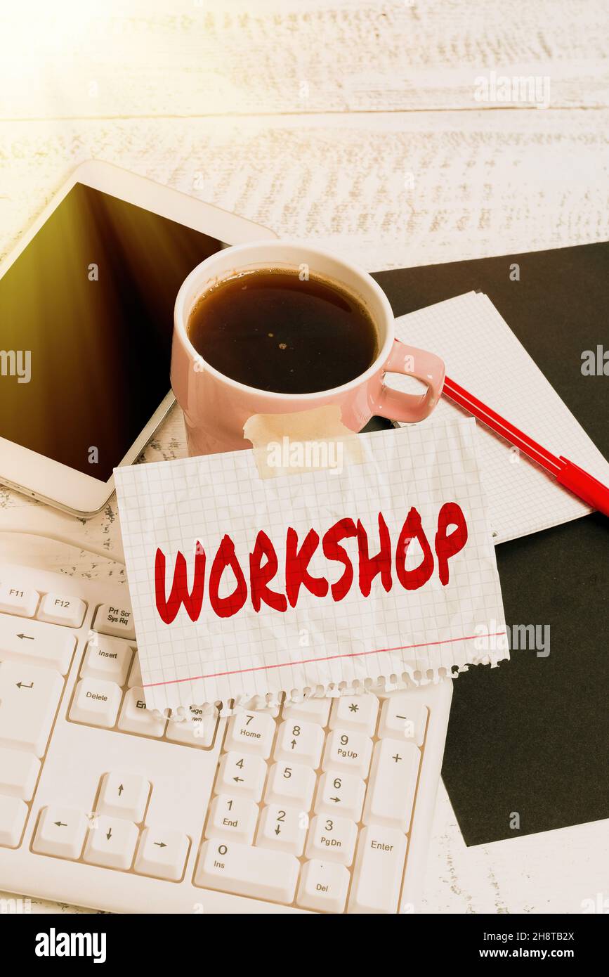 Text caption presenting Workshop. Word Written on room or building in ...