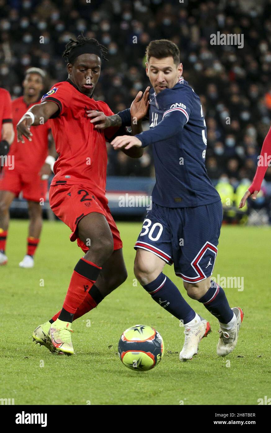 Lionel Messi of PSG, Jordan Lotomba of Nice (left) during the French ...