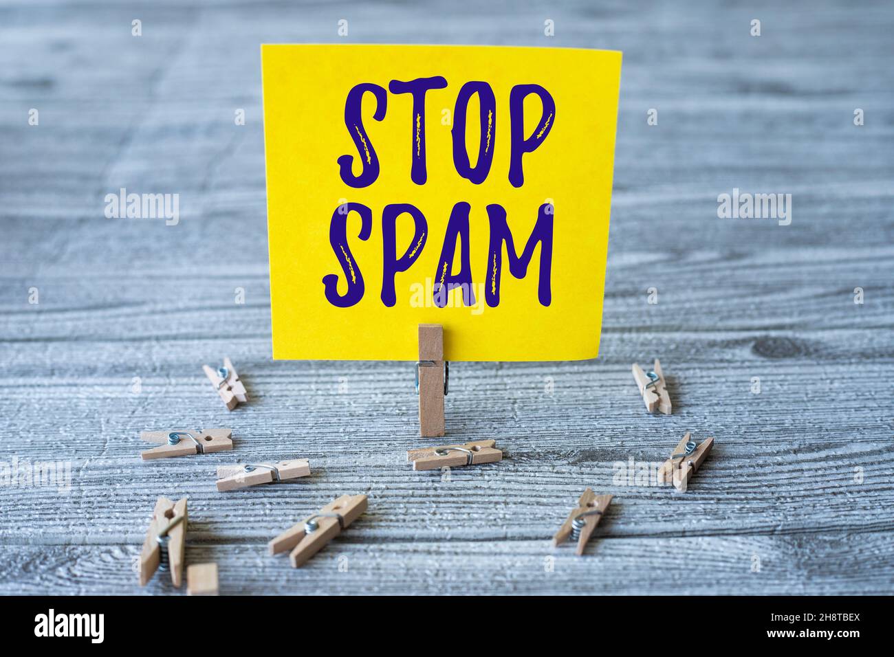 Hand writing sign Stop Spam. Concept meaning end the Intrusive or ...