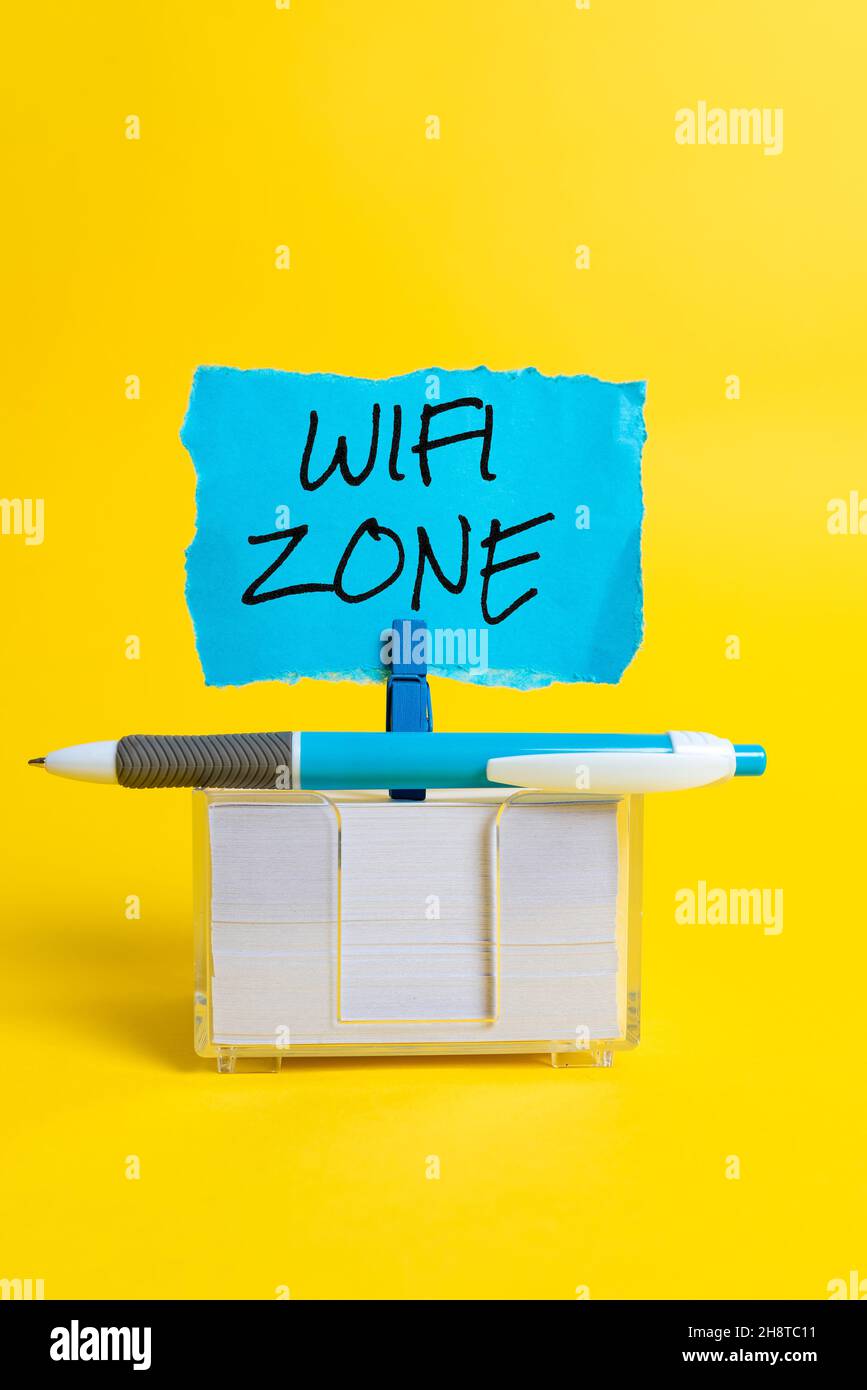 Writing displaying text Wifi Zone. Concept meaning provide wireless ...