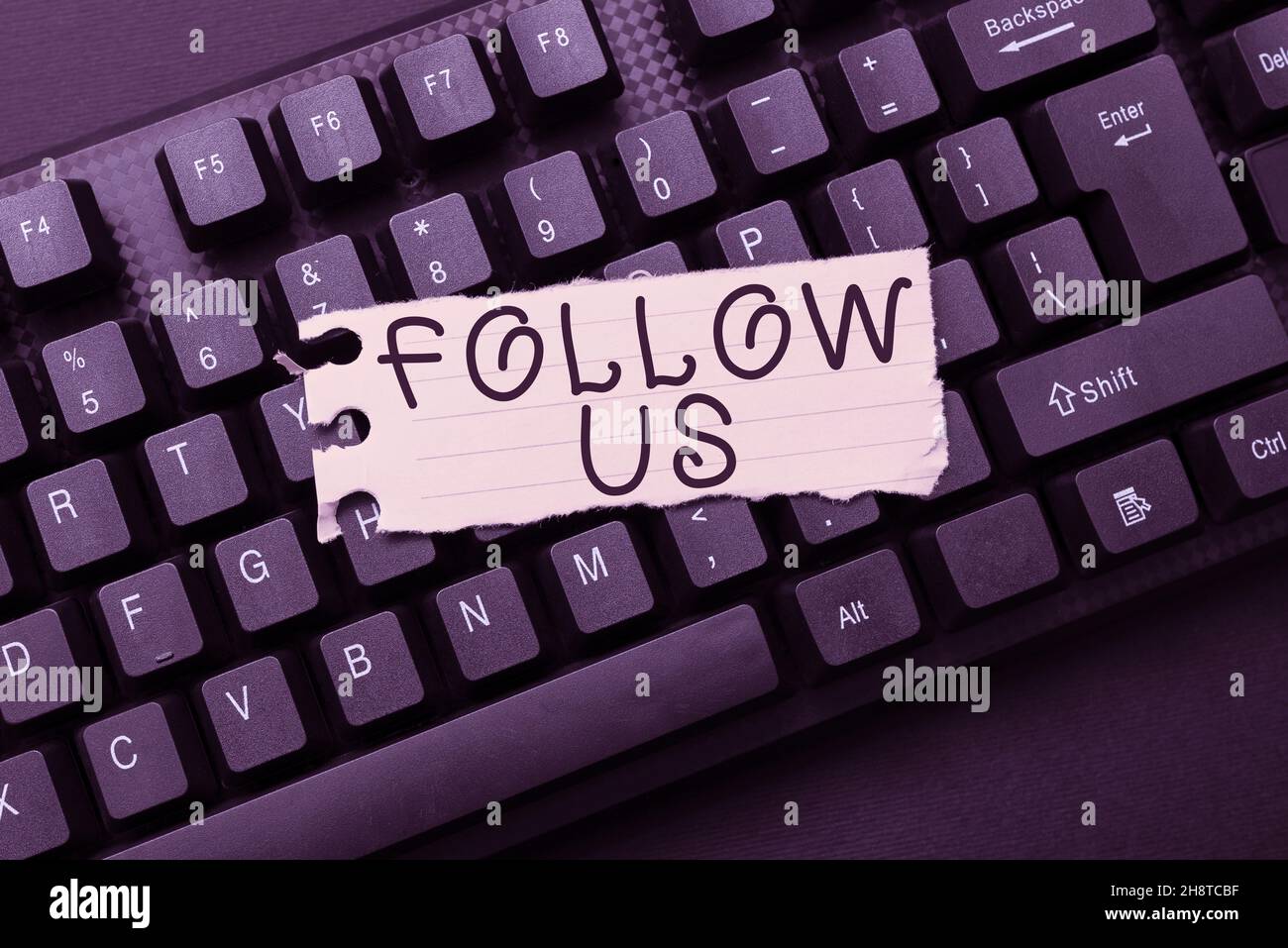 Conceptual caption Follow Us. Business idea To invite a person or group ...